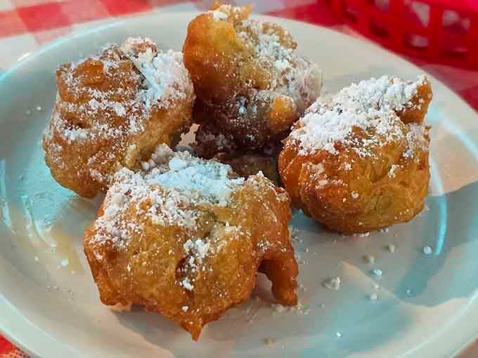 These powdered sugar-dusted corn fritters are basically little clouds of happiness you can actually eat.