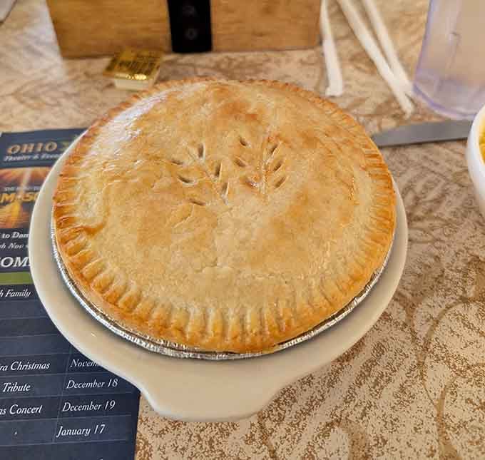 That whole chicken pot pie sitting there like edible architecture, ready to make all your comfort food dreams come true.