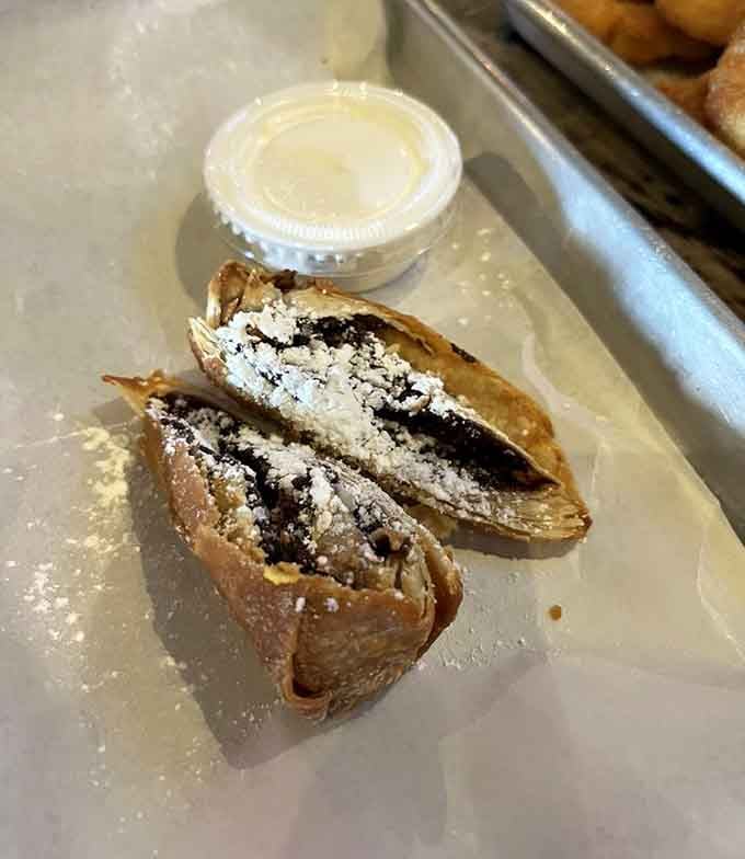 Chocolate-filled egg rolls dusted with powdered sugar, because sometimes dessert needs to be as surprising as a plot twist.