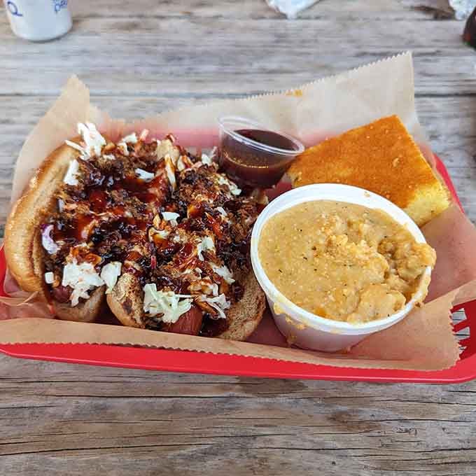 These hot dogs went to barbecue school and graduated with honors, topped with slaw and sauce.