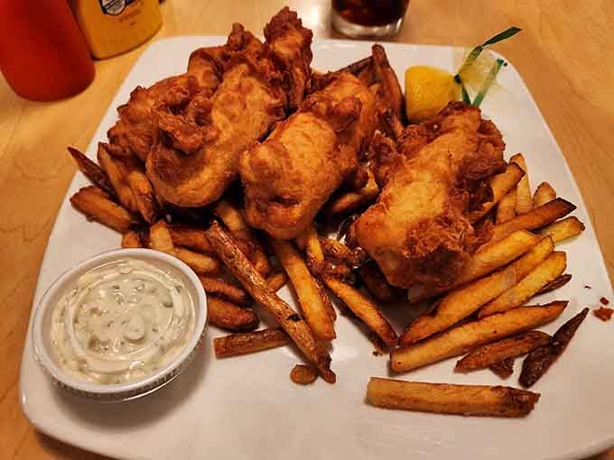 Fish and chips that would make a British pub jealous, with a side of those famous sweet potato fries. The crispy-to-tender ratio is mathematical perfection.