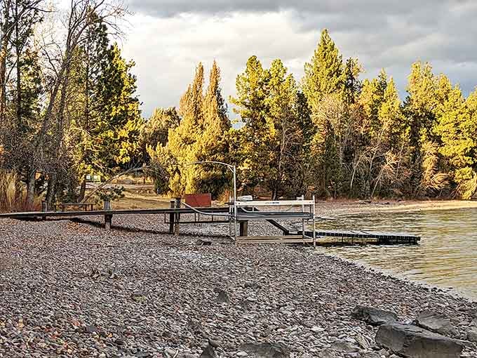 This isn't just a dock&mdash;it's your gateway to adventure. The weathered wood and pebble beach have witnessed countless summer memories.
