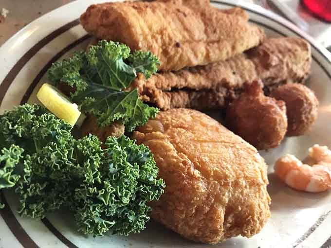 Golden-fried perfection meets fresh catch simplicity. This platter doesn't need fancy garnishes when the seafood speaks so eloquently for itself.