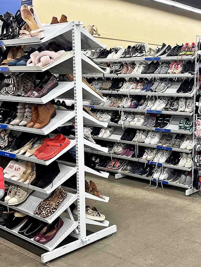 Shoe paradise where footwear tells stories of corporate meetings, first dates, and ill-advised hiking trips. Some barely worn, as if their owners had second thoughts.