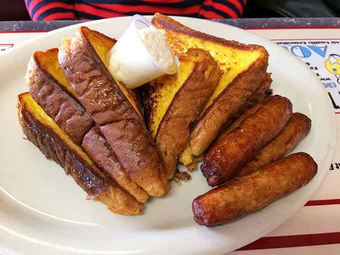 French toast and sausage links that could make even your cardiologist secretly jealous. Worth every delicious calorie.