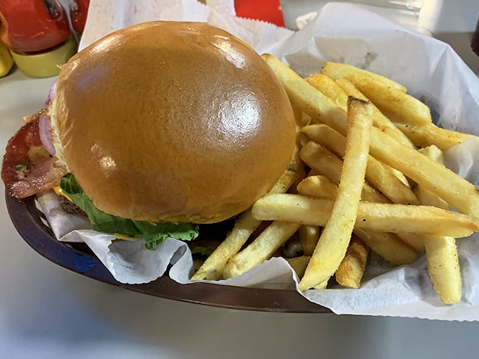 The Ric Flair Burger arrives with fries and enough swagger to make any wrestling fan do a double-take.