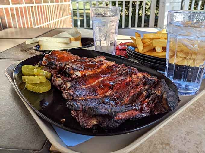 These ribs have that gorgeous char and glistening sauce that makes grown adults forget their table manners.