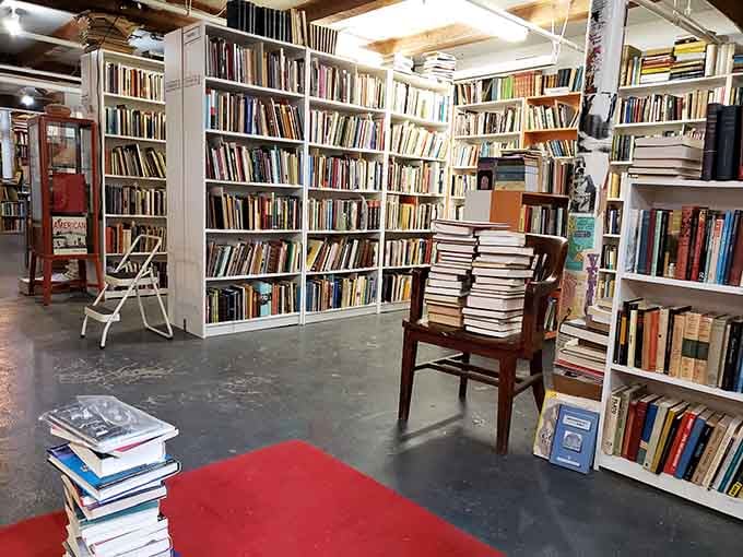White shelves tower overhead, packed with enough reading material to keep you busy until the next millennium.