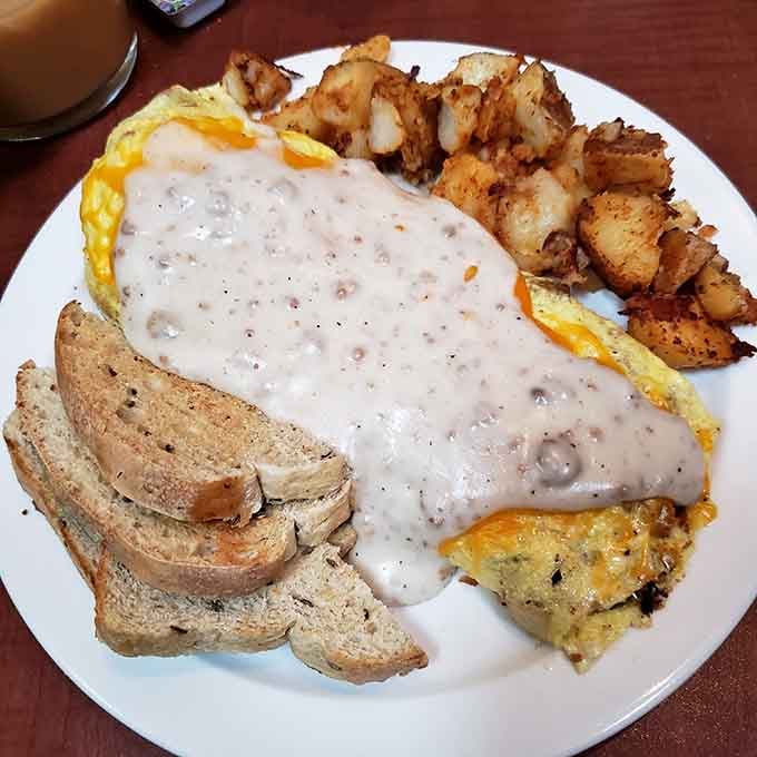 When your omelet arrives looking this fluffy and golden, you know the kitchen means serious business.