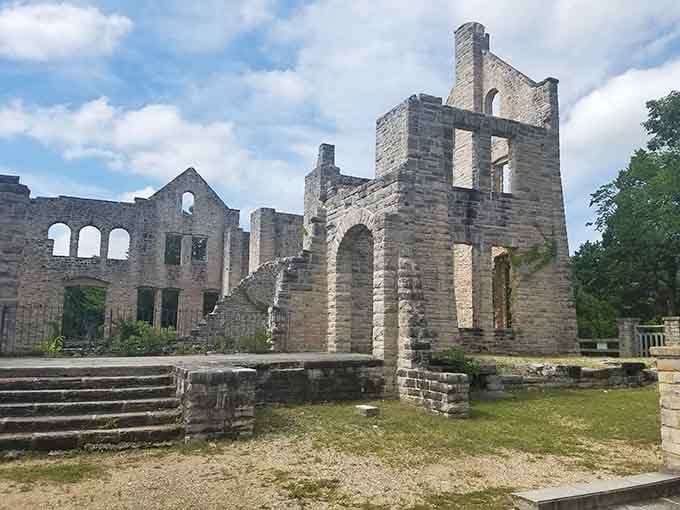 Stone walls and empty windows create a hauntingly beautiful scene straight from a Gothic novel.