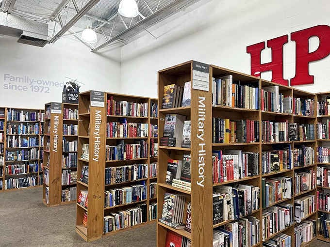 Military history buffs could spend days exploring these shelves without exhausting the collection of wartime tales and strategies.