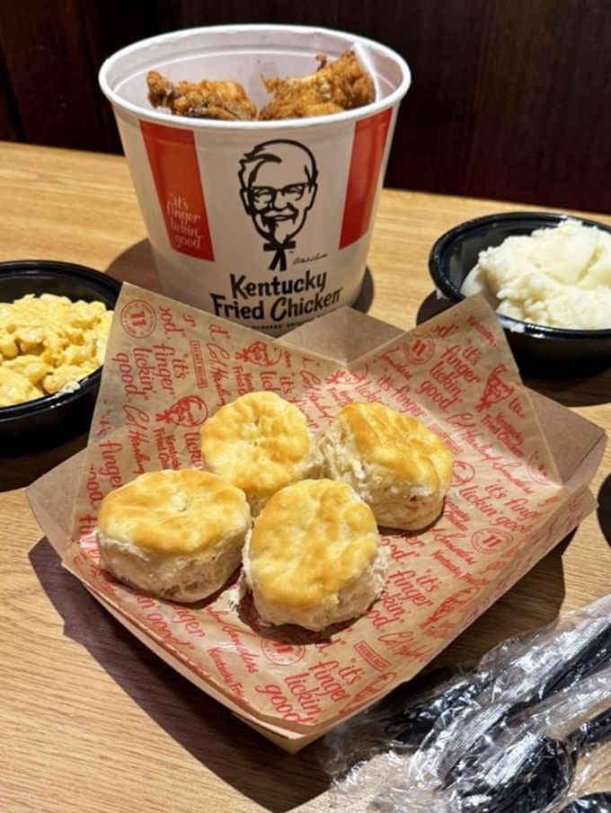 Those fluffy biscuits paired with a bucket of chicken make you understand why this place became legendary.