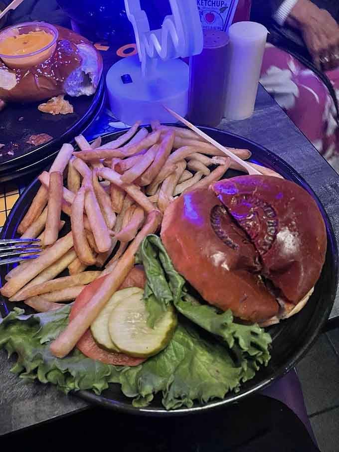 Sometimes you just need a classic cheeseburger with fries, even when you're dining in a haunted house atmosphere.