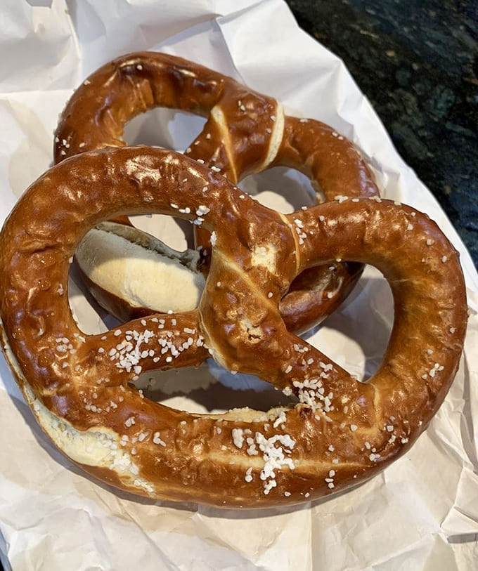 Fresh pretzels with that perfect golden sheen and salt crystals that sparkle like tiny delicious diamonds.