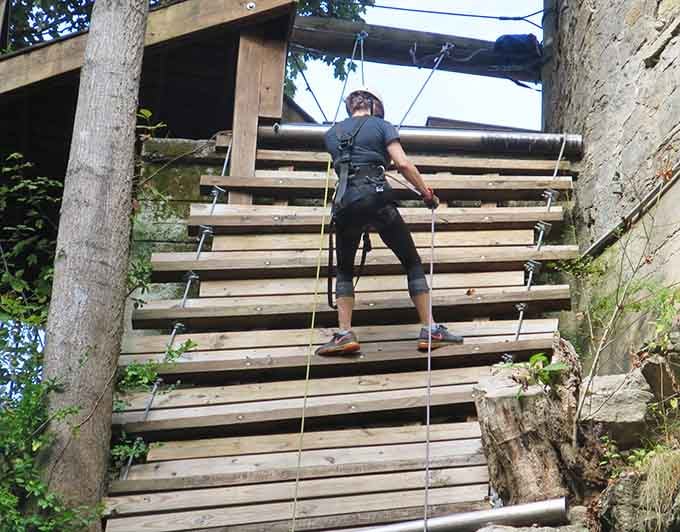 Adventure seekers can rappel into the cave's depths, because apparently some people need extra excitement beyond the swinging bridge.