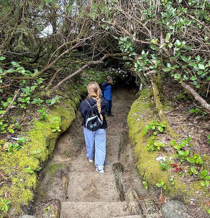 Nothing says "family bonding" quite like ducking through a moss tunnel that looks straight out of Tolkien's imagination.