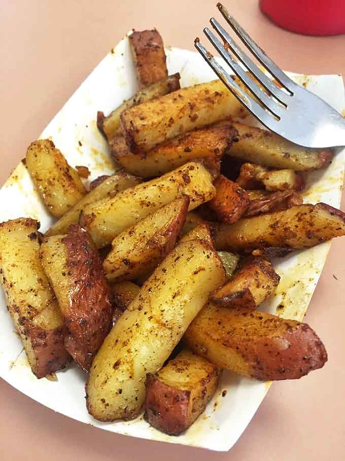 These home fries aren't just a side dish &ndash; they're potato chunks that went to finishing school, graduating with honors in seasoning and crispness.