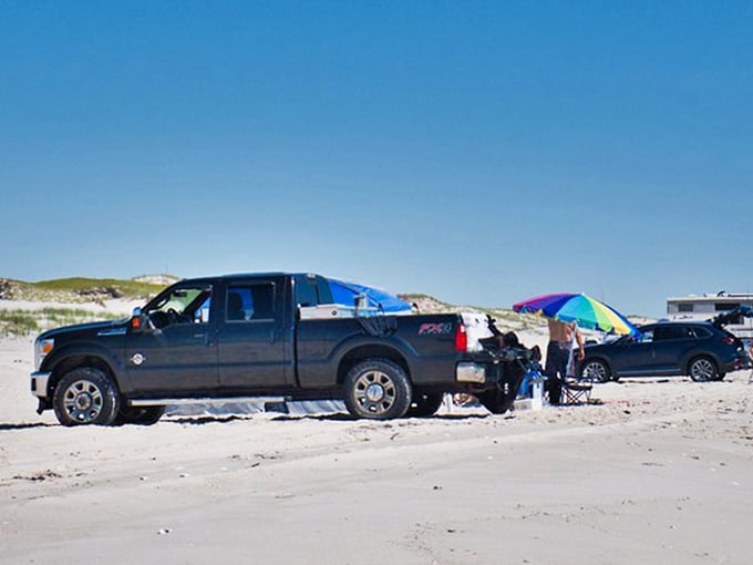 Four-wheel-drive beach access: because sometimes paradise requires the right vehicle and a permit.