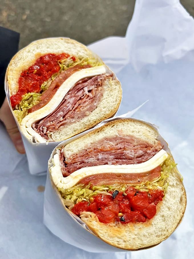 The Italian Special, sliced in half to reveal its architectural perfection&mdash;layers of cured meats, cheese, and roasted peppers creating the Manhattan skyline of sandwiches.