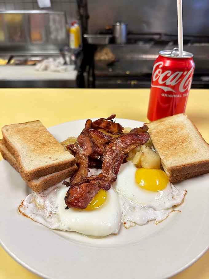 Two eggs, bacon, toast, and home fries: the breakfast quartet that never goes out of style.