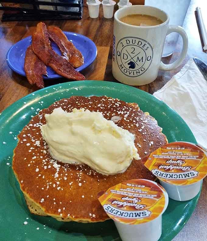 Golden pancakes topped with whipped butter prove that sometimes the classics need absolutely no improvement whatsoever.