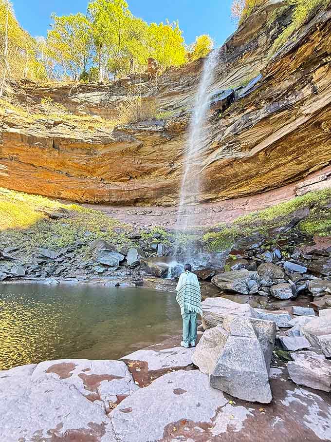 Looking up from the base reveals the full majesty of both tiers against brilliant fall foliage.
