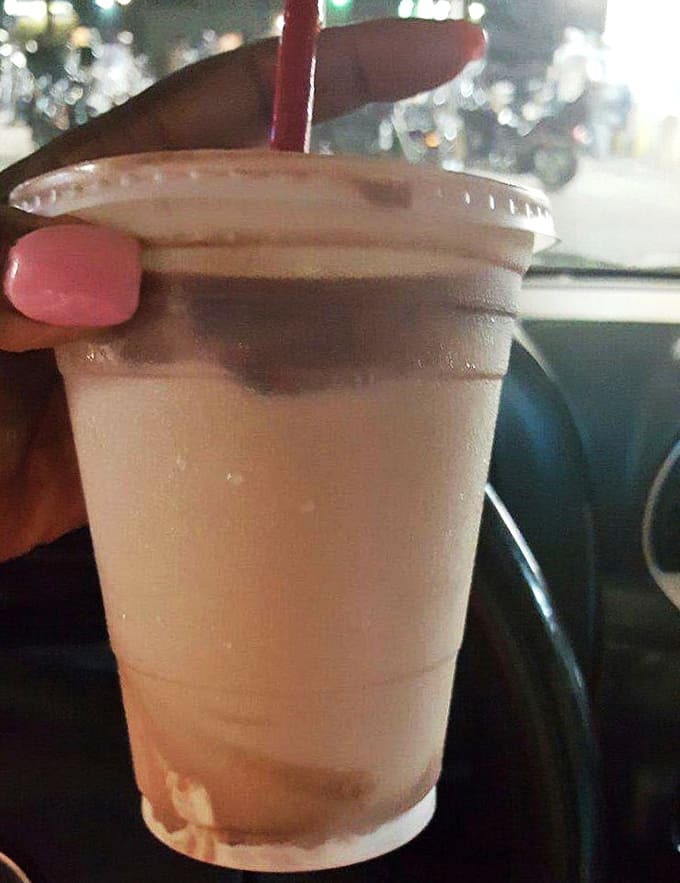 Chocolate milkshake so rich it requires commitment, determination, and possibly a spoon as backup for your straw.