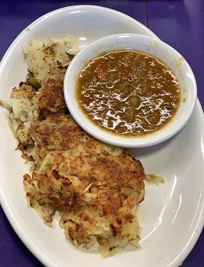 Golden hash browns with a side of green chili prove Colorado knows how to start a morning right.