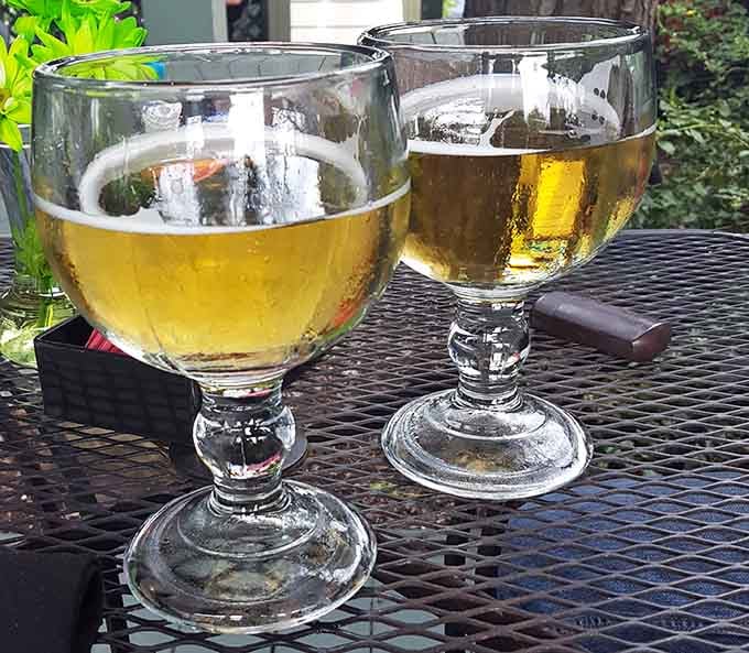 Two perfectly chilled beers on the patio, because some decisions in life are blissfully simple and universally correct.