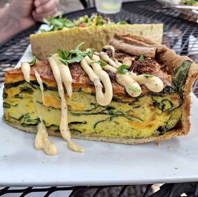 That golden quiche is basically a savory custard masterpiece, and yes, you absolutely deserve a slice this size.