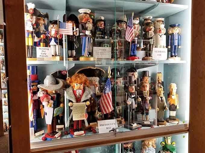 Presidents and veterans line up in miniature formation, making American history surprisingly adorable and wooden.