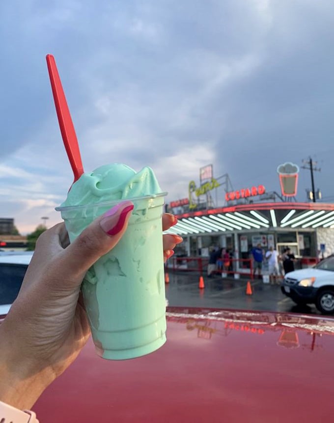 That mint green shake looks like it came straight from a 1950s soda fountain, and we're absolutely here for it.
