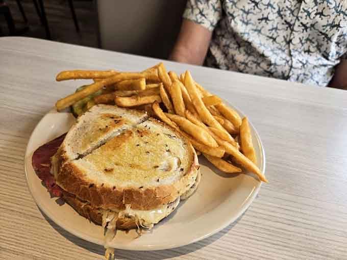A Reuben this well-constructed deserves its own architectural award, served with fries that know their purpose.