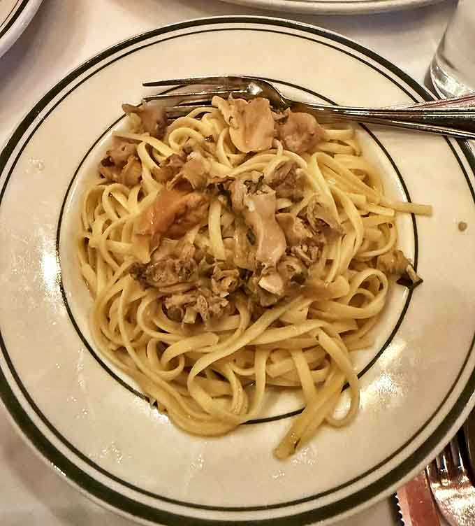 Linguine with white clam sauce &ndash; where perfectly al dente pasta meets briny treasures from the sea in a garlic-infused symphony that demands bread for sopping.