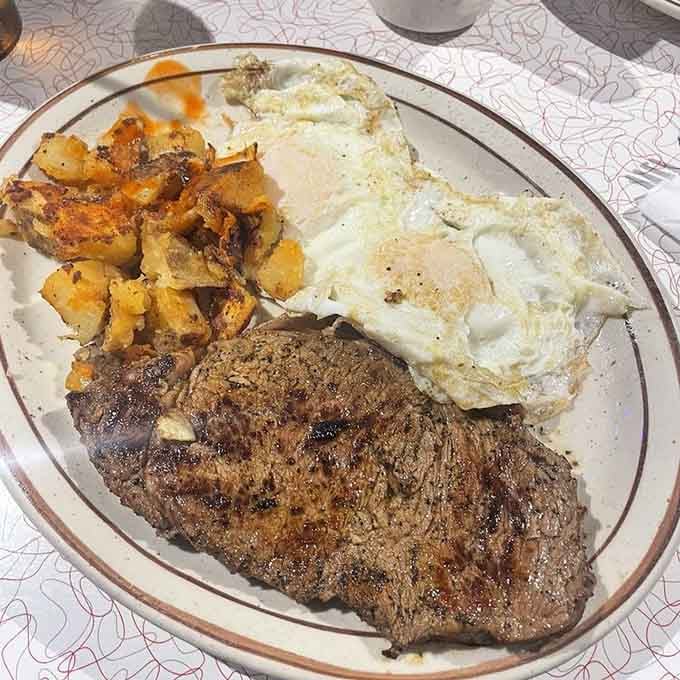Steak and eggs with crispy home fries: the kind of hearty breakfast that fuels actual productivity, not just Instagram posts.