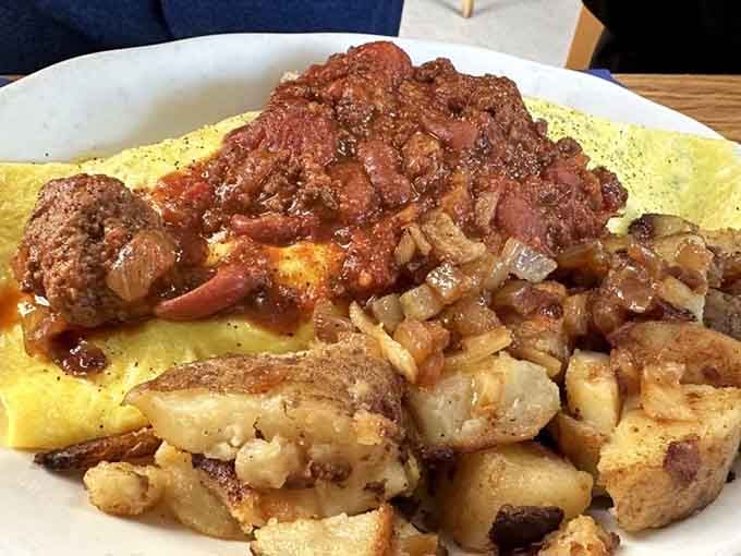 That omelet isn't just breakfast; it's a fluffy, golden reason to set your alarm clock early tomorrow.