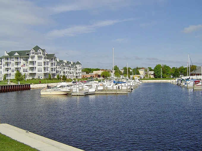 The marina where boats bob peacefully, waiting for their next adventure across waters that look deceptively calm and inviting.