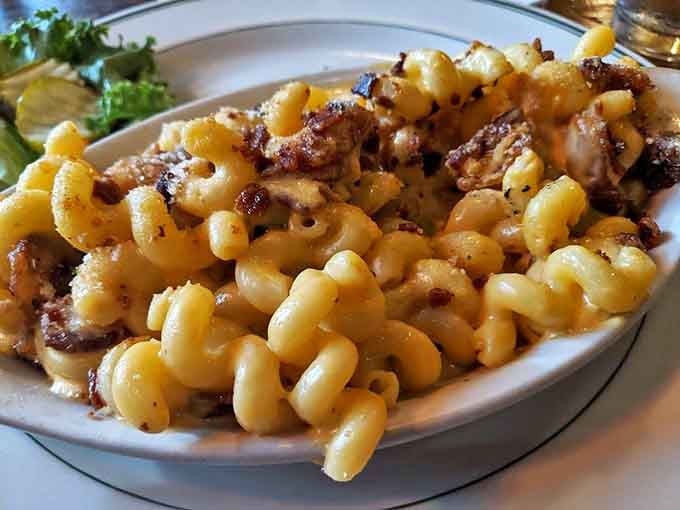 Mac and cheese that doesn't mess around&mdash;this isn't your childhood version unless your childhood was exceptionally blessed with bacon and real Wisconsin cheddar.
