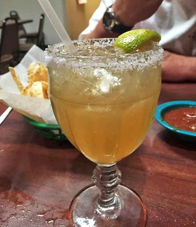The margarita arrives like liquid sunshine in a salt-rimmed goblet&mdash;proof that happiness can indeed be served in glassware.