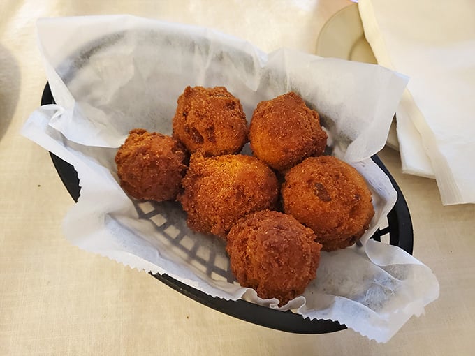 Golden hush puppies that prove sometimes the best things in life come in crispy, bite-sized packages.