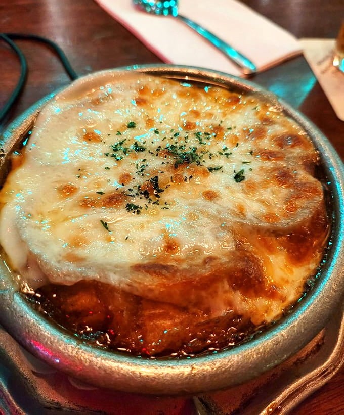 French onion soup with that perfect cheese pull—bubbling, golden, and exactly what your soul needs on a chilly day.