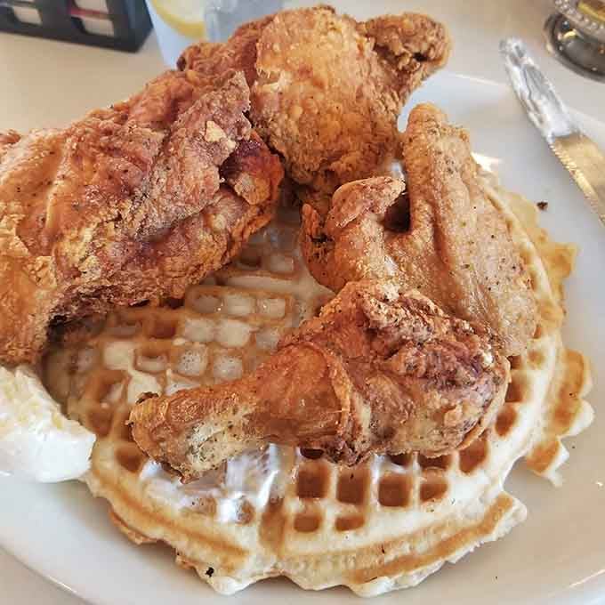 Crispy fried chicken piled on fluffy waffles is the kind of genius combination that makes you believe in happiness.
