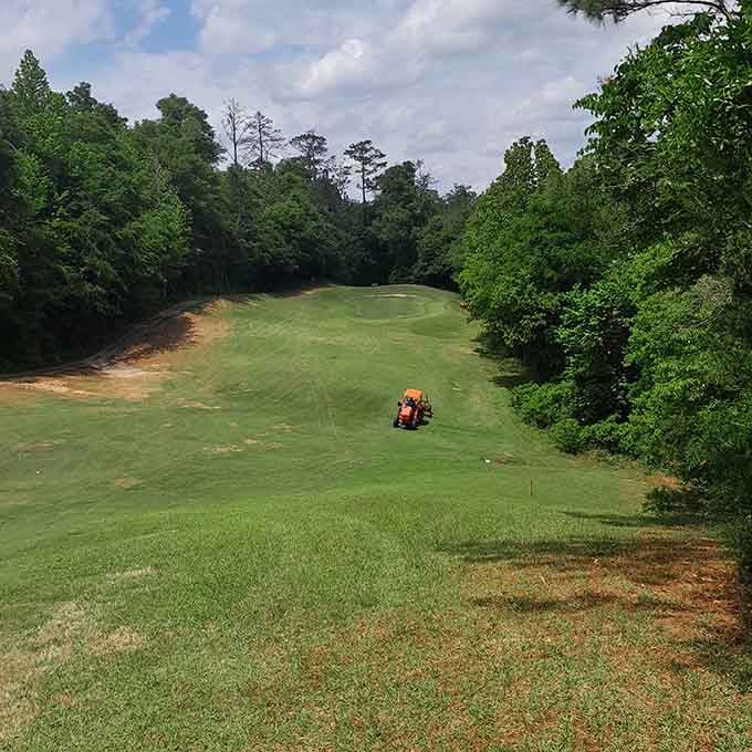 Rolling fairways disappear into the pines, proving that Monroeville takes its golf as seriously as its literary heritage.