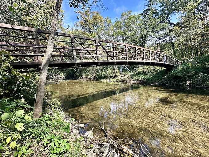 Above ground, peaceful bridges cross streams that eventually disappear into the underground world you're about to explore below.
