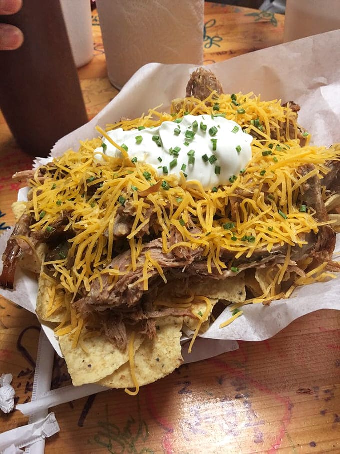BBQ nachos that redefine excess in the best possible way. A mountain of chips, meat, cheese, and toppings that makes sharing both necessary and slightly heartbreaking.