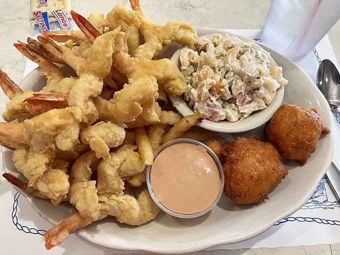 The legendary fried shrimp that launched a thousand return visits, golden and crispy beyond your wildest dreams.
