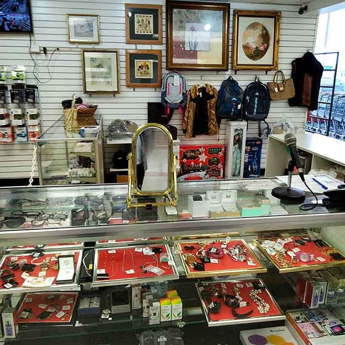 That jewelry counter sparkles with vintage treasures and framed art, like grandma's attic became a boutique.