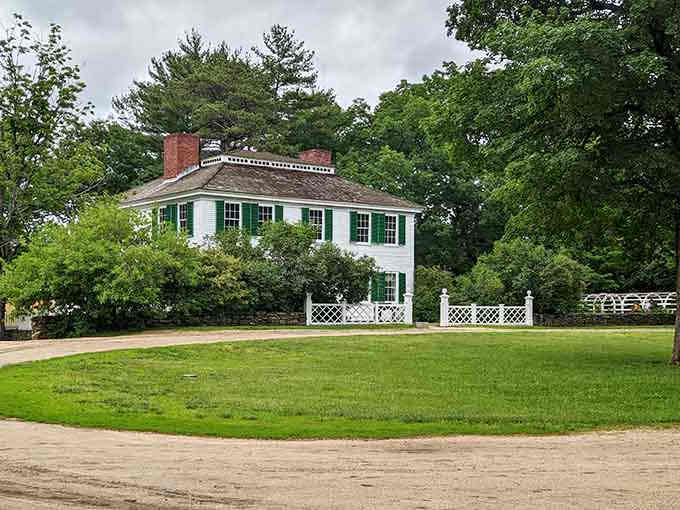 The Salem Towne House sits pretty behind its white picket fence, representing the fancier side of 1830s village life.