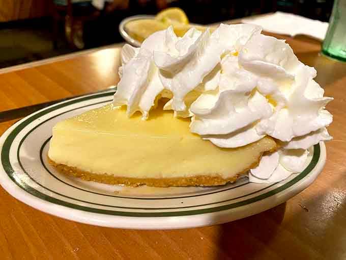 Key lime pie topped with whipped cream mountains&mdash;because sometimes more is actually more, and that's perfectly fine.