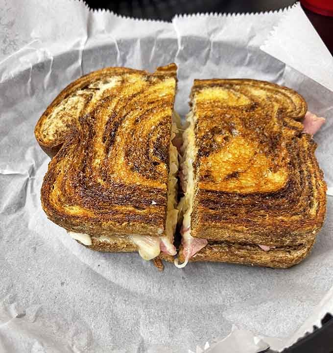 Corned beef piled this high isn't just lunch, it's an architectural achievement worthy of serious engineering respect.